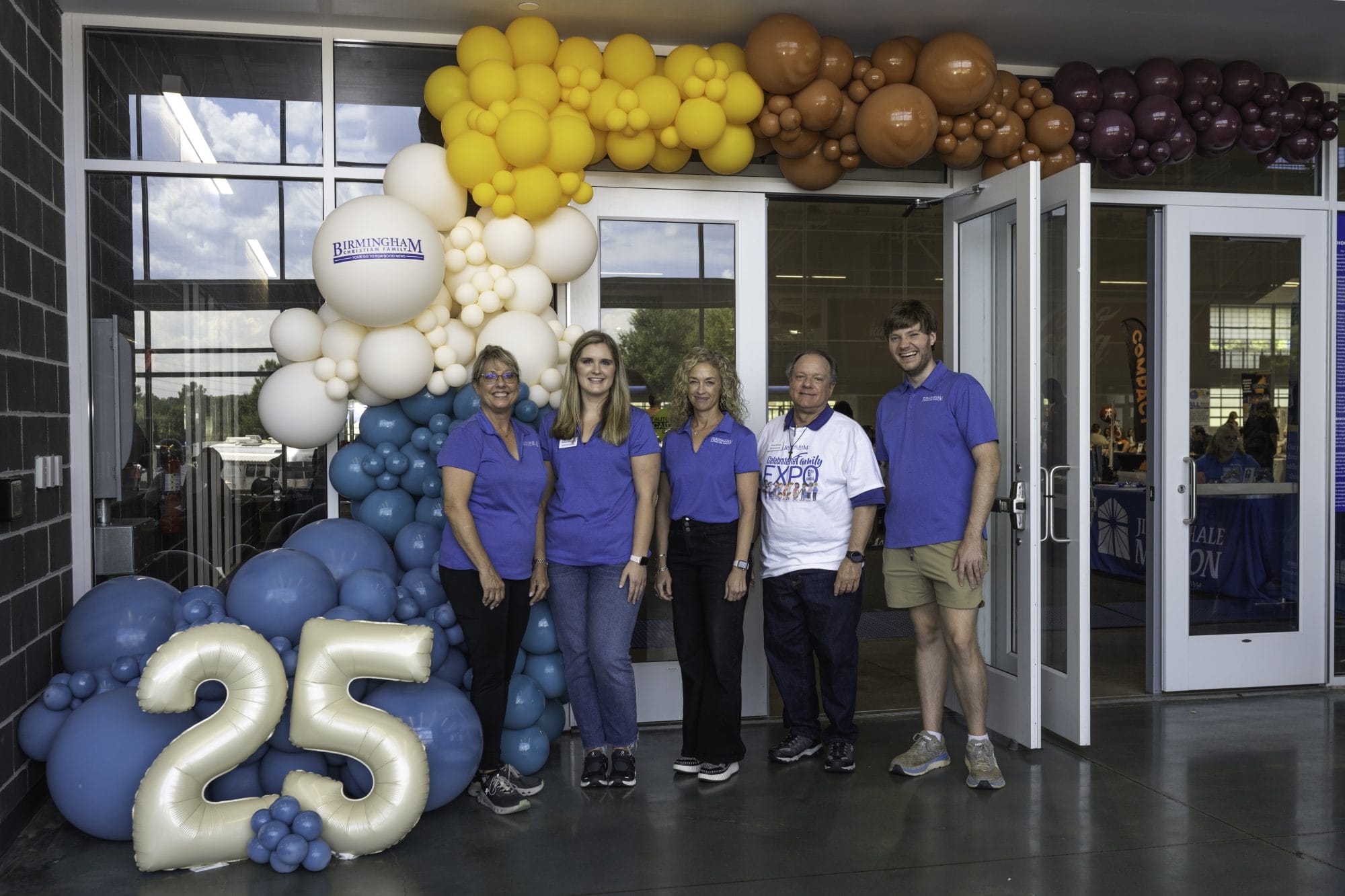 BCF team photo with balloon arch - Birmingham Christian Family Magazine